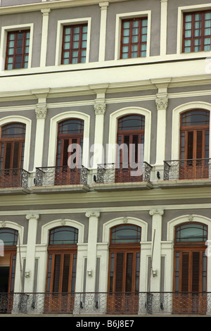 Cuba, Havana, building, shuttered windows, Cuban flag. 2016-03-25 Stock ...