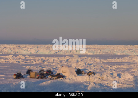Arctic oven tent with a sled out on the pack ice over the Chukchi Sea ...
