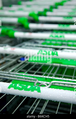 A close up of the handle of an ASDA shopping trolley Stock Photo - Alamy