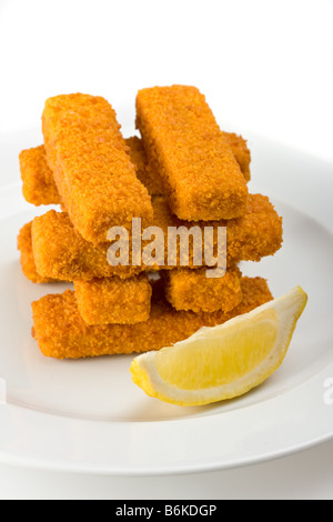 eight fish fingers on a white plate Stock Photo - Alamy