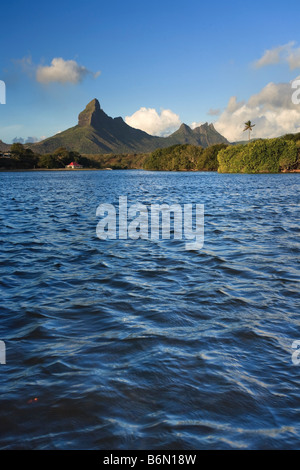 Surfing at sunset at Tamarin beach, Mauritius Stock Photo - Alamy