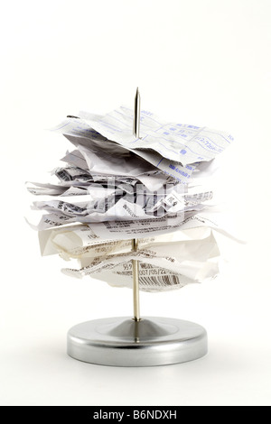 Receipts on spike Stock Photo - Alamy