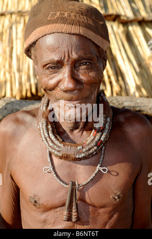 Elderly man, head of a Himba village, traditional Himba village ...