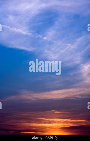 sunsets and the evening sky with an orange cast with the foreground in ...