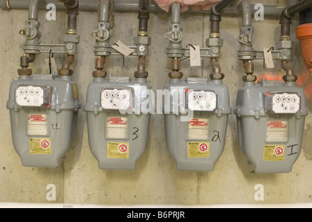 row of gas meters in condominium complex Stock Photo - Alamy