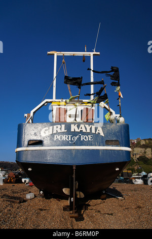 A beached old fishing trawler aground on the shores of the Northern ...