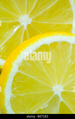 Freshly sliced lemons closeup Stock Photo - Alamy