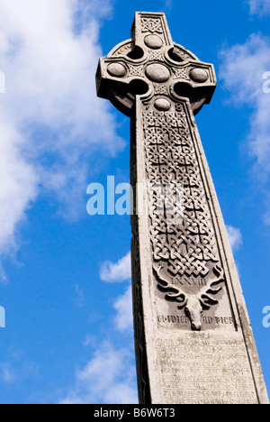 A stone Celtic Cross outside Holy Trinity Church, in the parish of ...