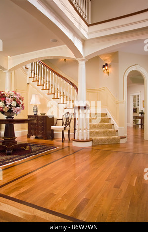 Entrance hall interior with the carpeted stairs Stock Photo - Alamy