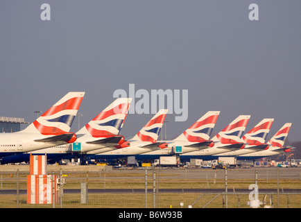 The tail fins of British Airways' aircraft parked at Terminal Four of ...