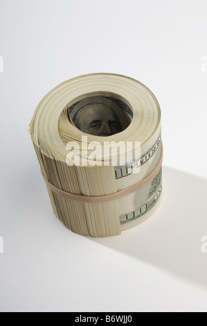 One-dollar bill rolled up into a tube Stock Photo - Alamy