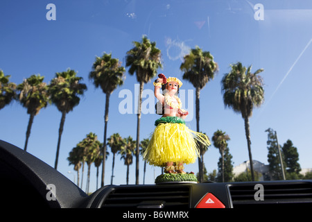 Hula car dashboard girl Stock Photo - Alamy
