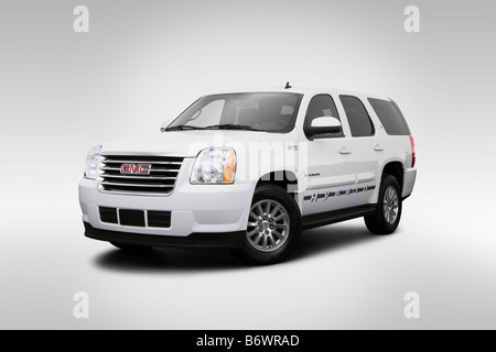 2009 GMC Yukon Hybrid in White - Drivers Side Profile Stock Photo - Alamy