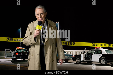 News presenter at crime scene Stock Photo - Alamy