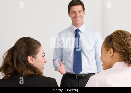 A lecturer teaching business students Stock Photo - Alamy