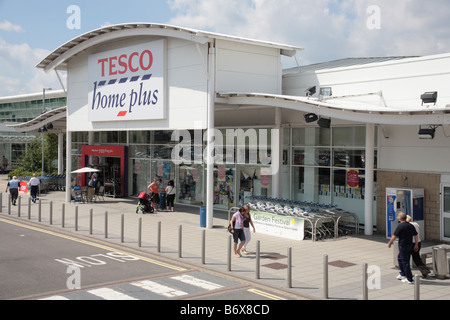Tesco Home Plus entrance to store and company logo sign at West Quay ...