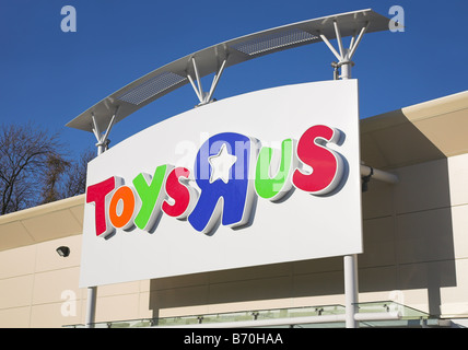 A logo sign outside of a Toys "R" Us retail store in Altoona ...