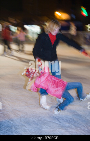 Young girl slipping over on ice, Cornwall Stock Photo - Alamy