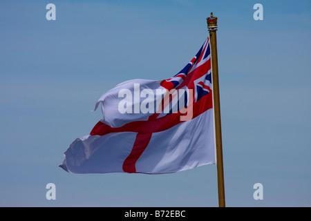 The White Ensign the flag of the Royal Navy flies from the top of ...