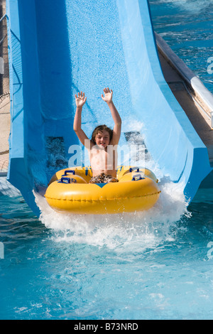 innertubes floating in swimming pool at water park Stock Photo - Alamy