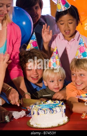 Kids waiting for a birthday cake Stock Photo - Alamy