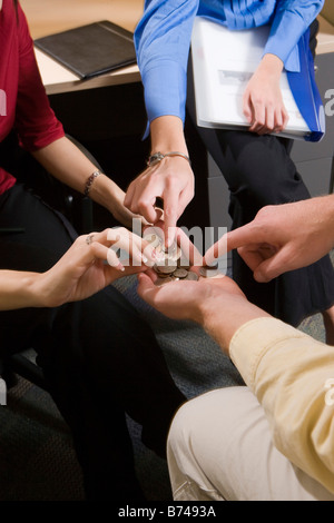 Hands counting money on a desk Stock Photo - Alamy