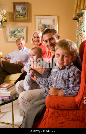 Baby boy sitting in the room Stock Photo - Alamy