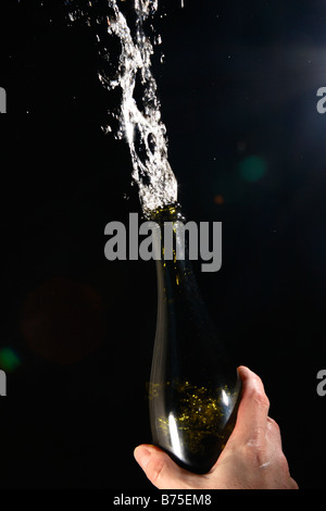 champagne bottle eruption Stock Photo - Alamy