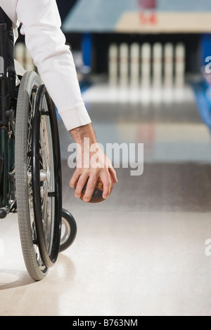 Male playing ten pin bowling Stock Photo - Alamy
