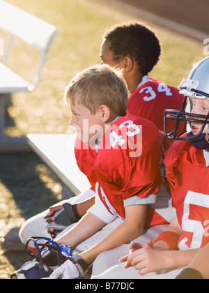 American football player on the bench Stock Photo - Alamy