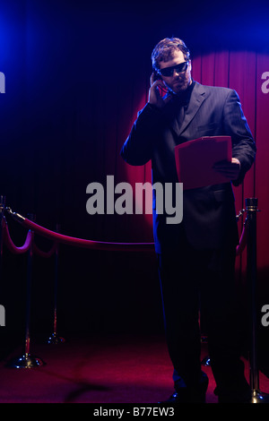 Bouncer at red carpet event Stock Photo - Alamy