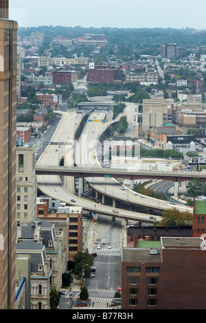 View of the Jones Falls Expressway and buildings in downtown at night ...
