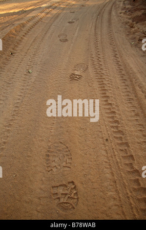 footprints on a road Stock Photo - Alamy