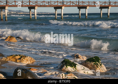 A jetty on the shore of Marbella, Spain Stock Photo - Alamy