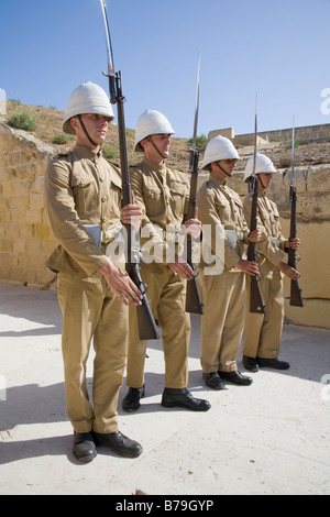Four soldiers holding their rifles with fixed bayonets, Fort Rinella, Kalkara, Malta Stock Photo ...