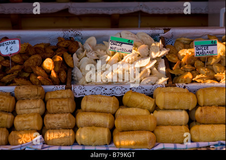 Traditional smoked goat cheese called oscypek on sale Gubalowka Hill ...