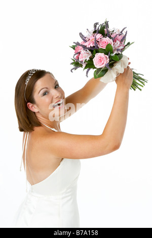 Happy young white woman holding flag of Luxembourg and covers her mouth ...