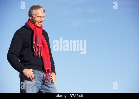 Senior man smiling happy standing at new home Stock Photo - Alamy