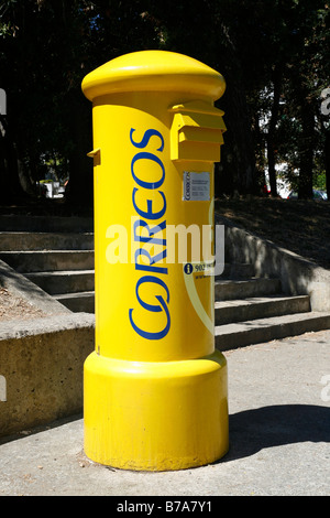 photo of yellow Correos mail box of Spanish postal service Stock Photo ...