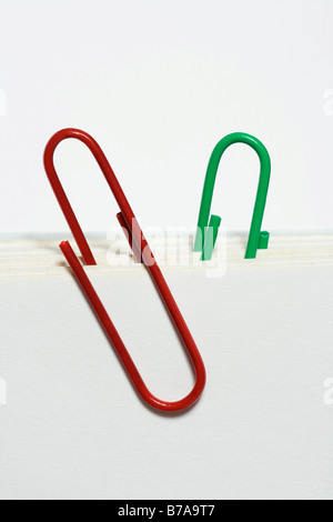 Close up of two paper clips on a laptop Stock Photo - Alamy
