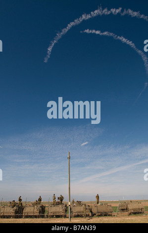 Israeli soldiers on the Gaza Strip, as it is seen from its Israeli side ...