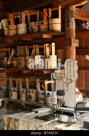 Japanese Religious Water Buckets at a Japanese cemetery in Tokyo Japan ...