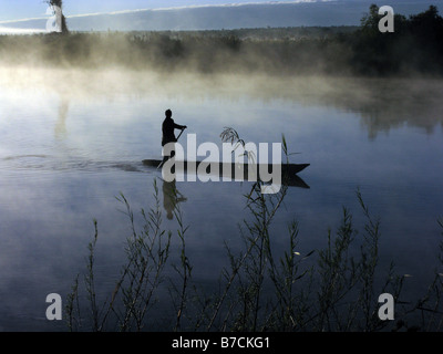 Bemba fisherman in dugout canoe on Luapula river close to Mambilima ...