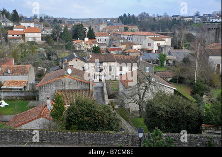 View of the picturesque medieval town of Parthenay with an old bridge ...