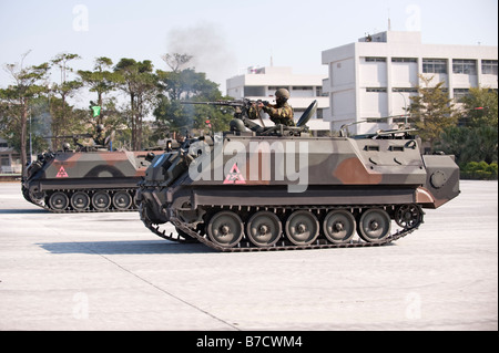 Taiwanese Soldier Firing A M2 Machine Gun In A CM-22 Armored Carrier ...