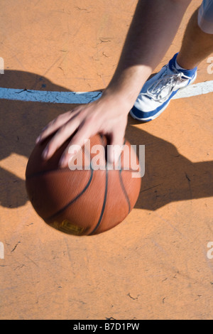 Basketball and Hand Dribbling Stock Photo - Alamy