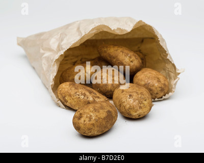 New potatoes in a white paper bag, environmentally friendly ...
