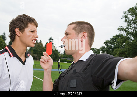 Referee giving red card Stock Photo - Alamy