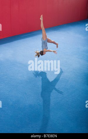 Female gymnast doing floor exercises Stock Photo - Alamy