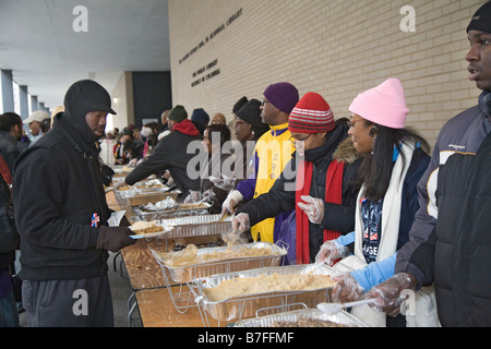 Volunteers Serve Meal to the Homeless at Outdoor Soup Kitchen Stock ...